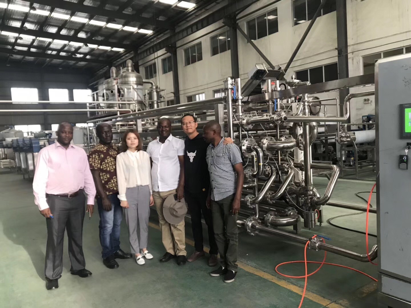 Uganda Ministry of Agriculture came to accept the mango puree ...